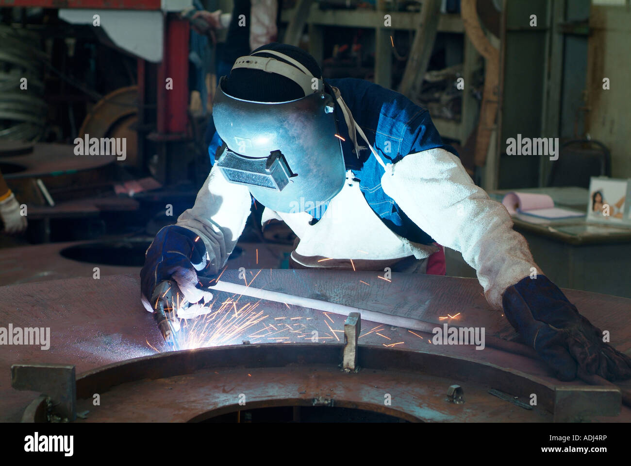 Welder working on stainless steel Stock Photo - Alamy
