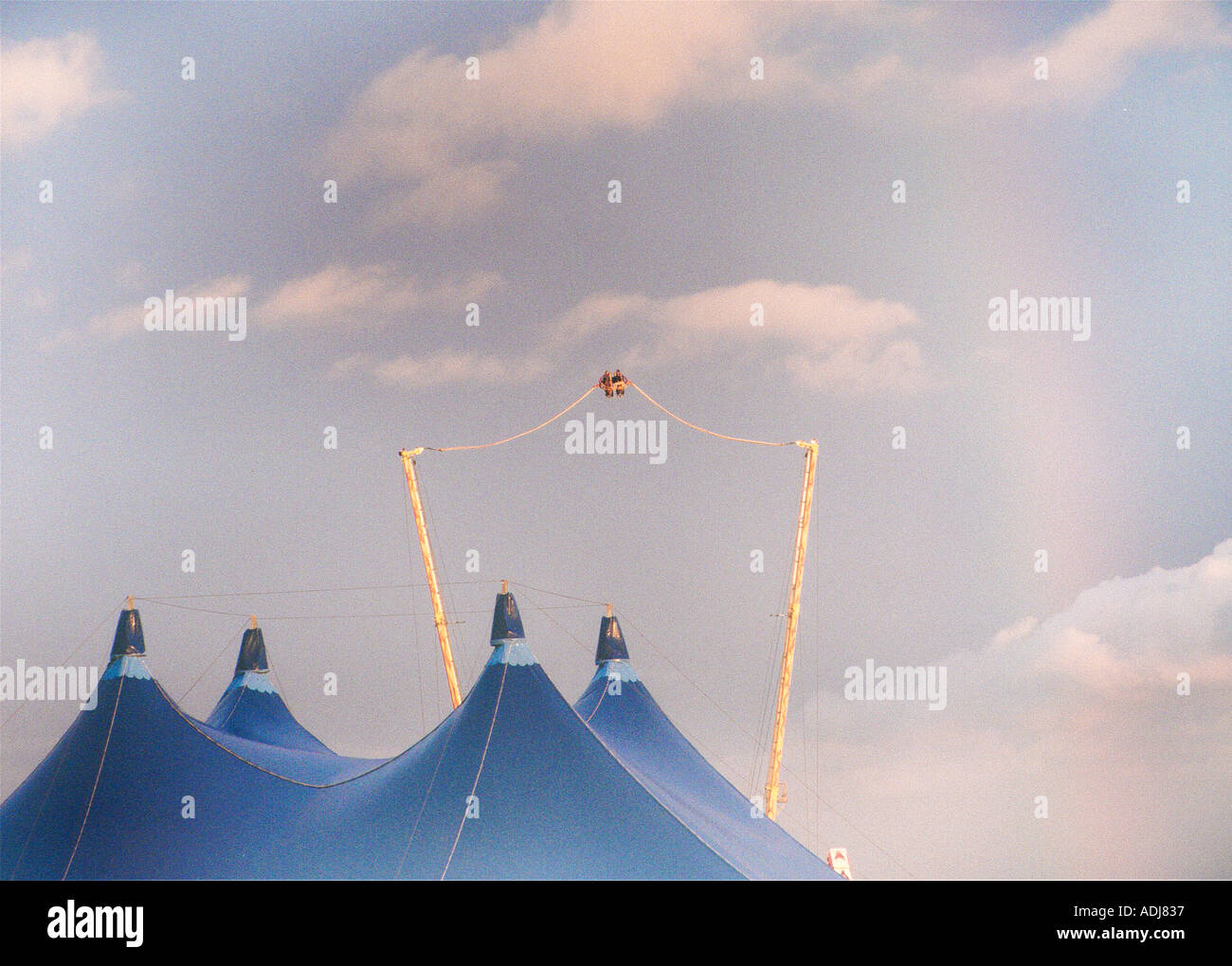 big top fairground ride and rainbow Stock Photo - Alamy