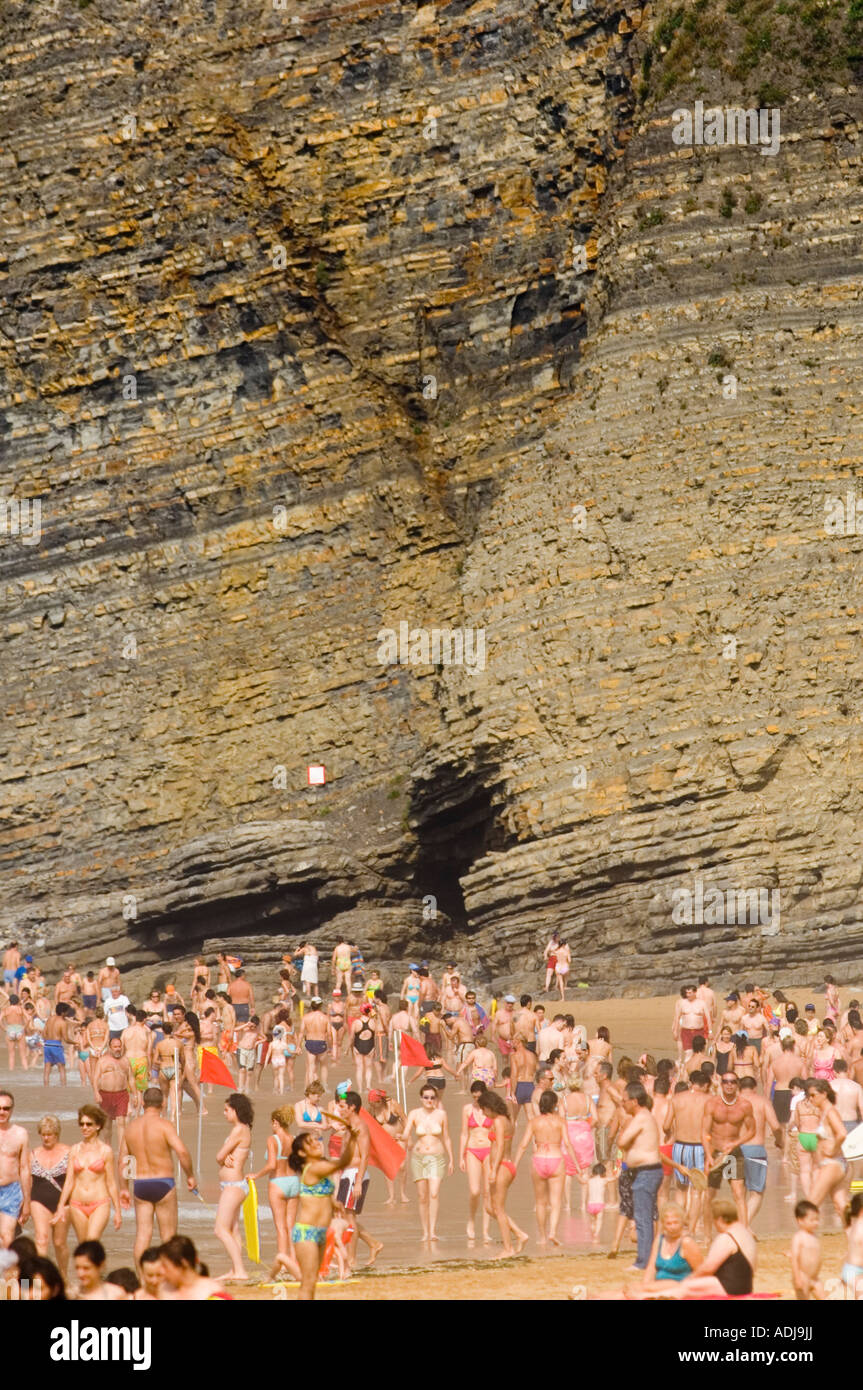 Crowded beach at Playa Los Rodiles, Asturias, Spain Stock Photo - Alamy