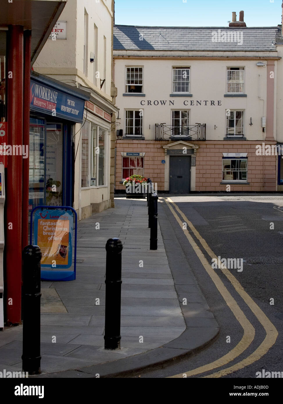 High Street Devizes town centre with double yellow lines in road ...