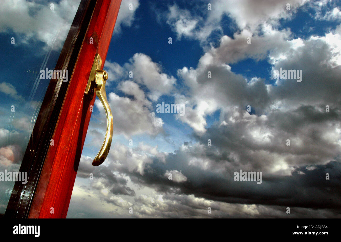 OPEN WINDOW WITH DRAMATIC SKY Stock Photo - Alamy