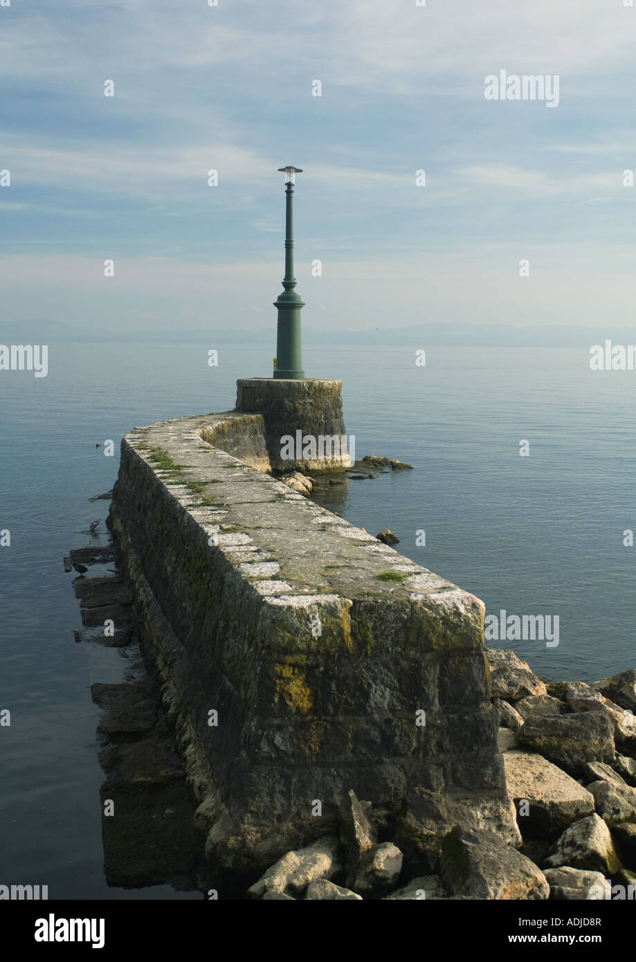 Breakwater with beacon Stock Photo - Alamy