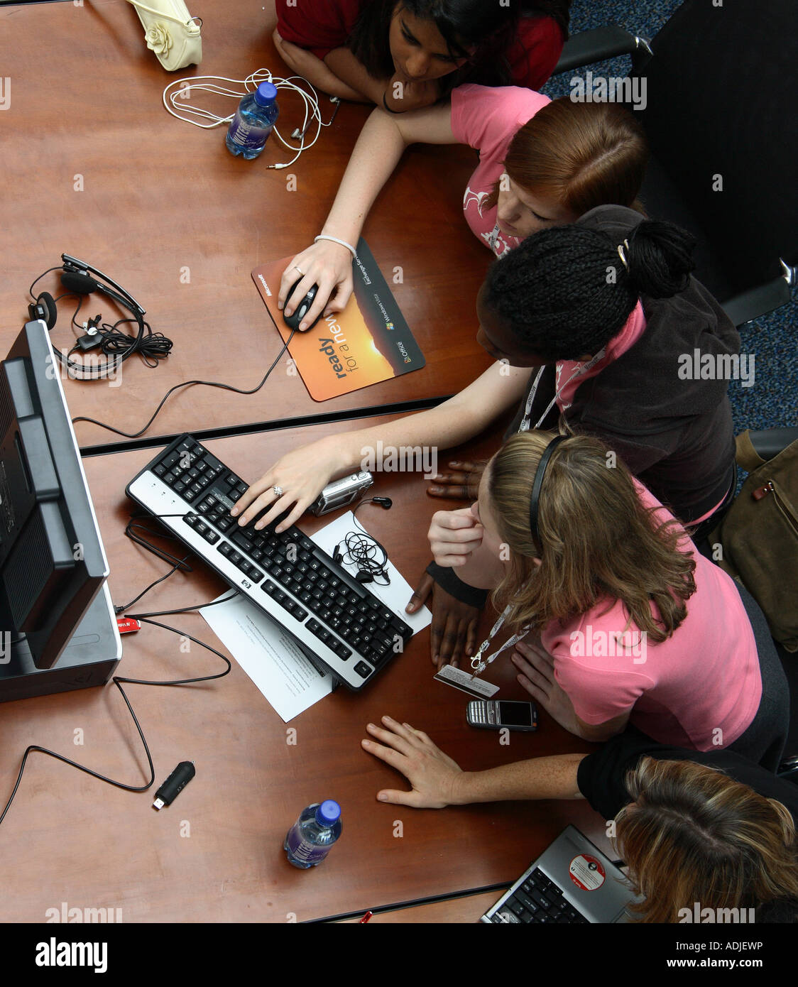 young girls using a pc Stock Photo - Alamy