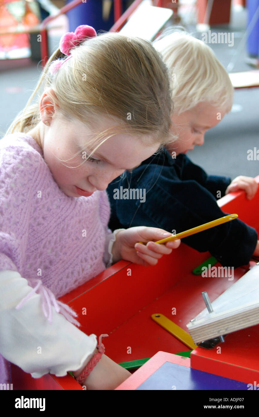 Children investigating hi-res stock photography and images - Alamy