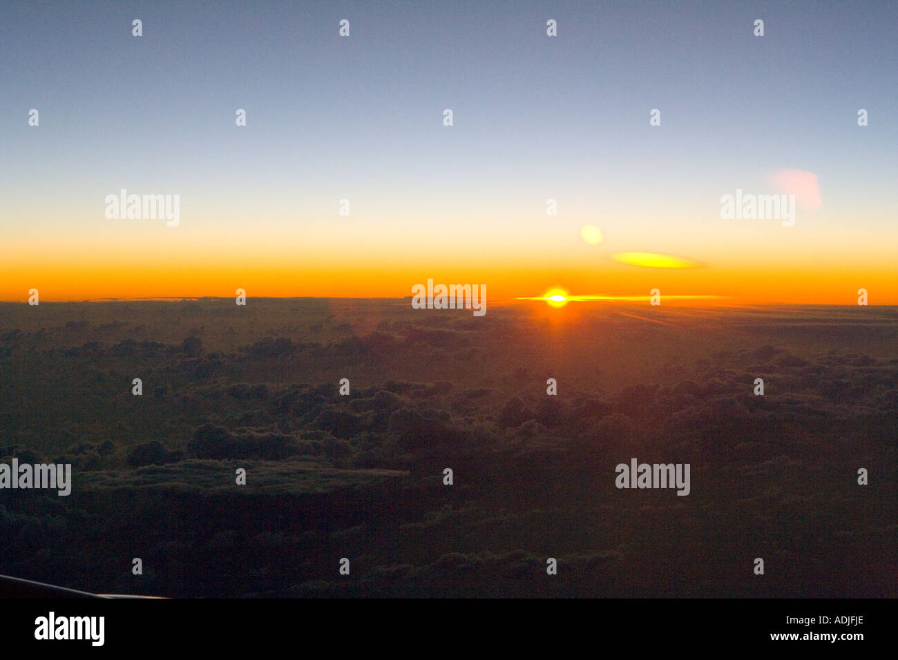 Sunrise and clouds over Indian Ocean Stock Photo - Alamy