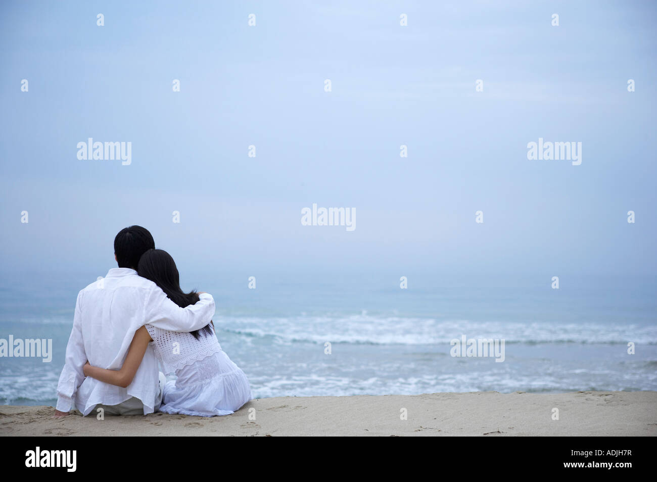 couple hug on the seashore Stock Photo - Alamy