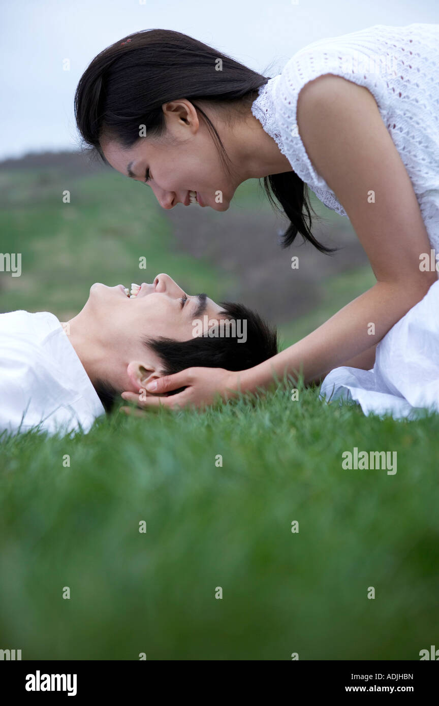 side of the couple facing each other Stock Photo - Alamy