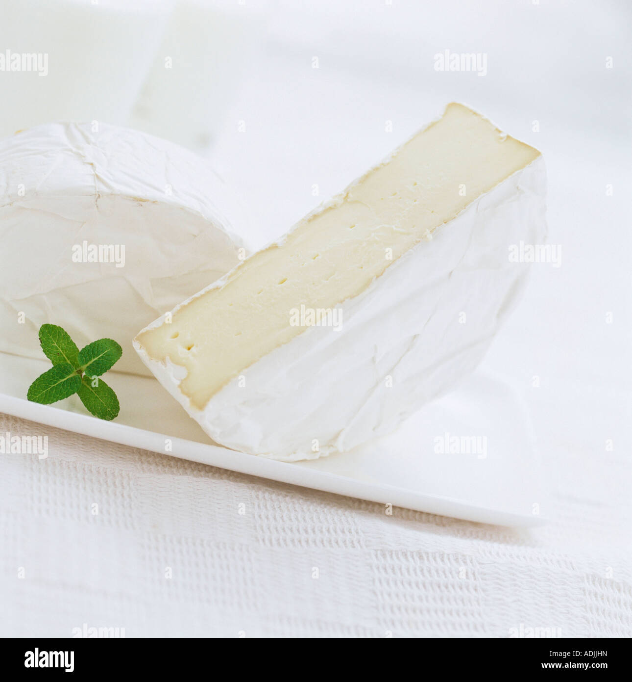 brie cheese plate dish buds cheese dairy food Stock Photo - Alamy