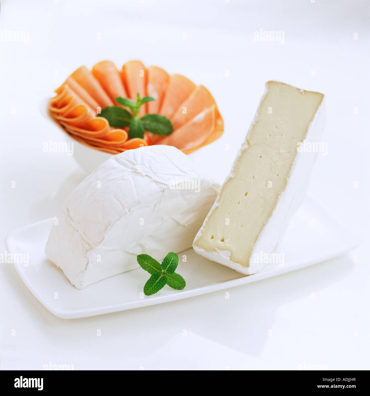 brie cheese plate dish buds cheese dairy food ham Stock Photo - Alamy