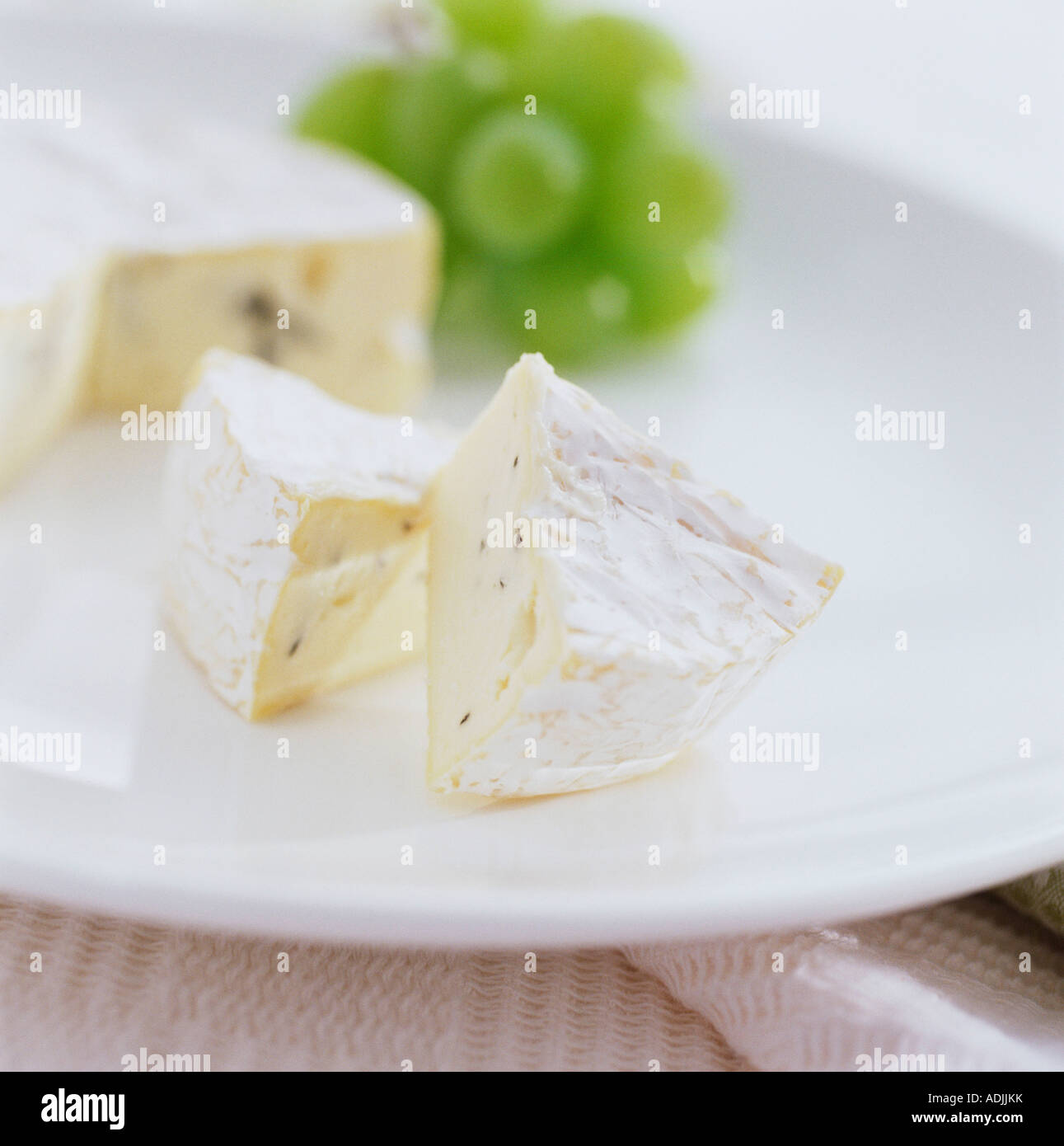 brie cheese plate dish piece dairy food cheese Stock Photo - Alamy