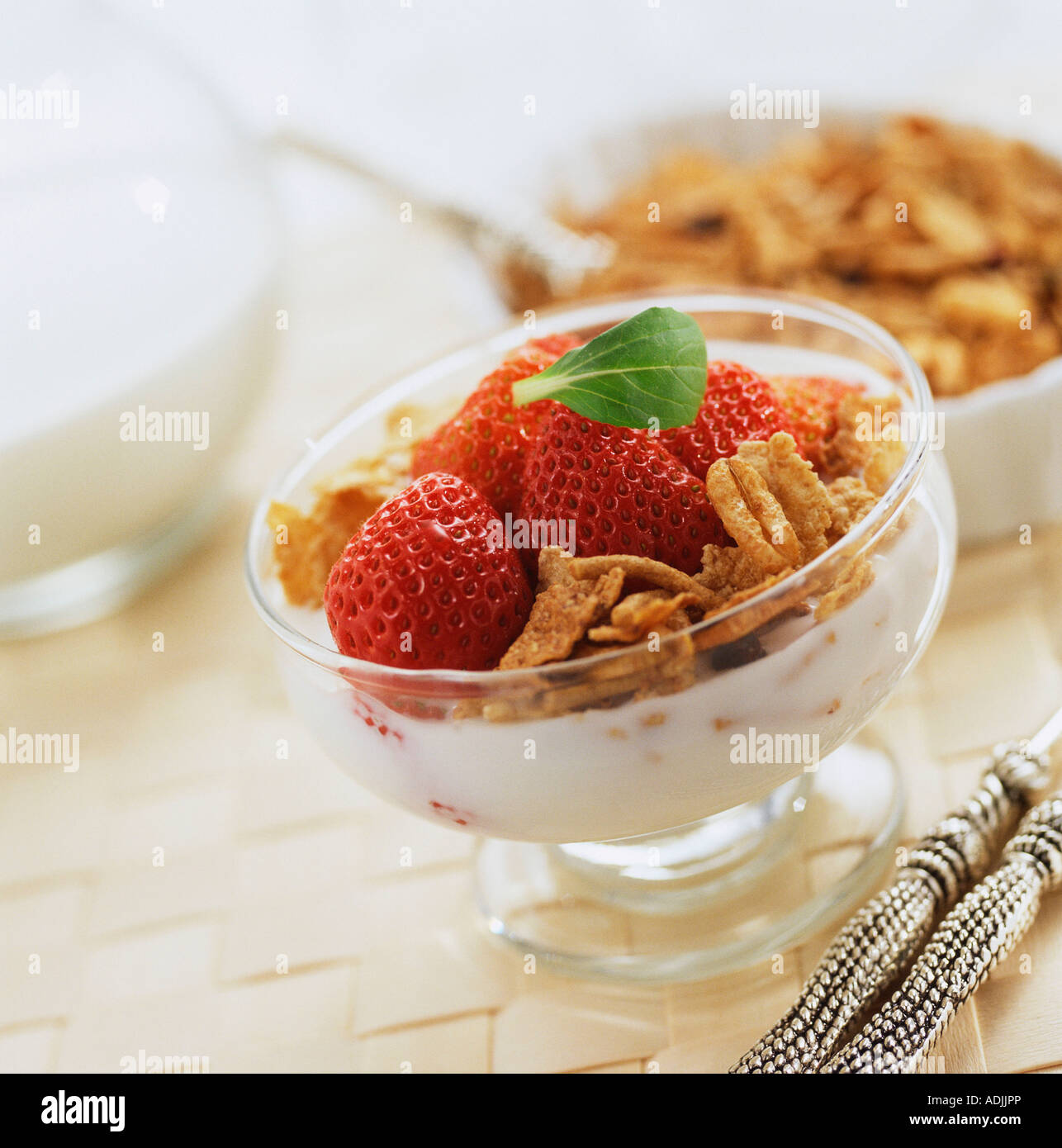 strawberry cereal flake bowl milk yogurt food Stock Photo - Alamy