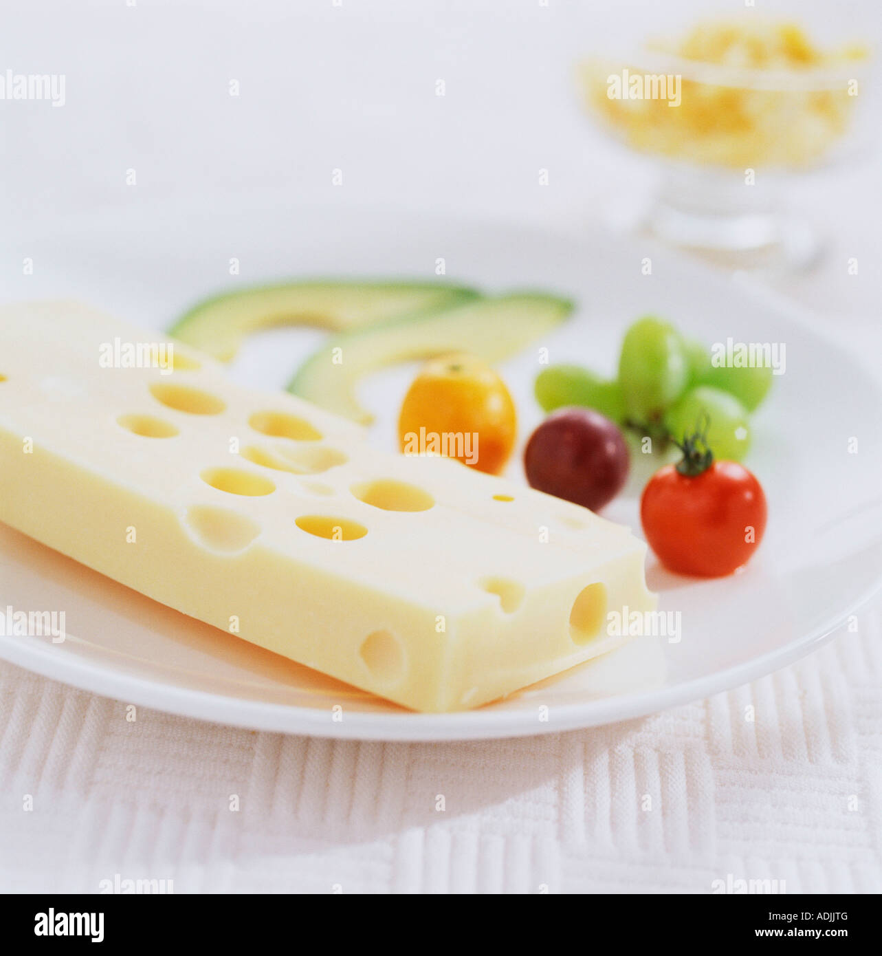 dairy food cheese Emmental cheese fruit dish plate Stock Photo - Alamy