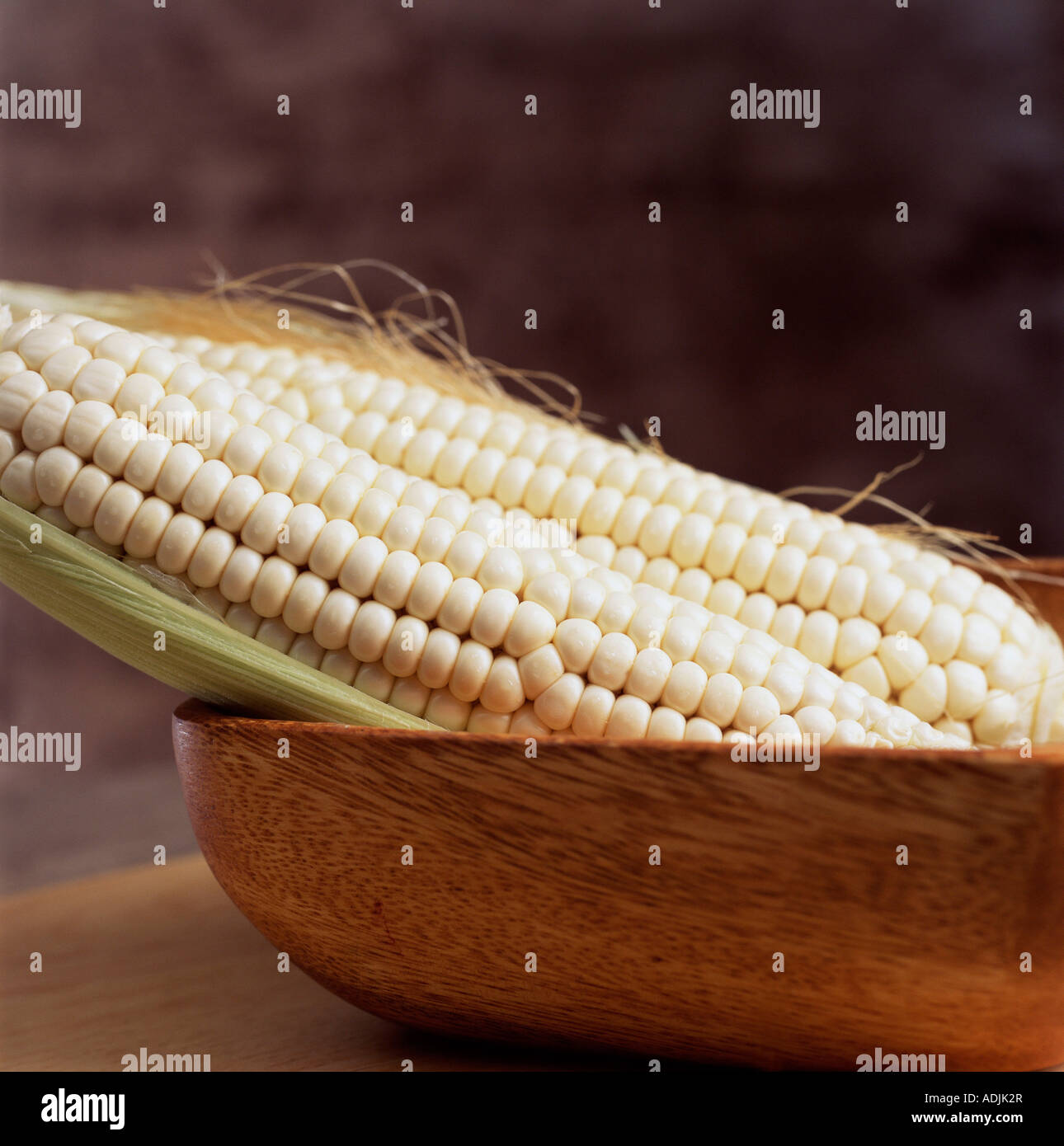Corns in wooden bowl hi-res stock photography and images - Alamy