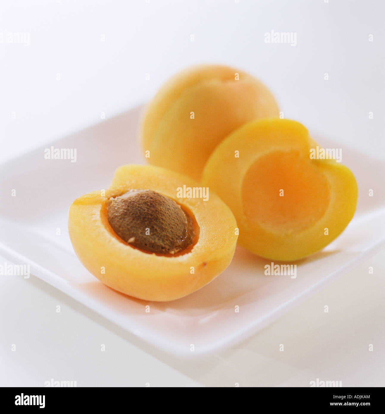 Sliced apricots on the plate Stock Photo - Alamy