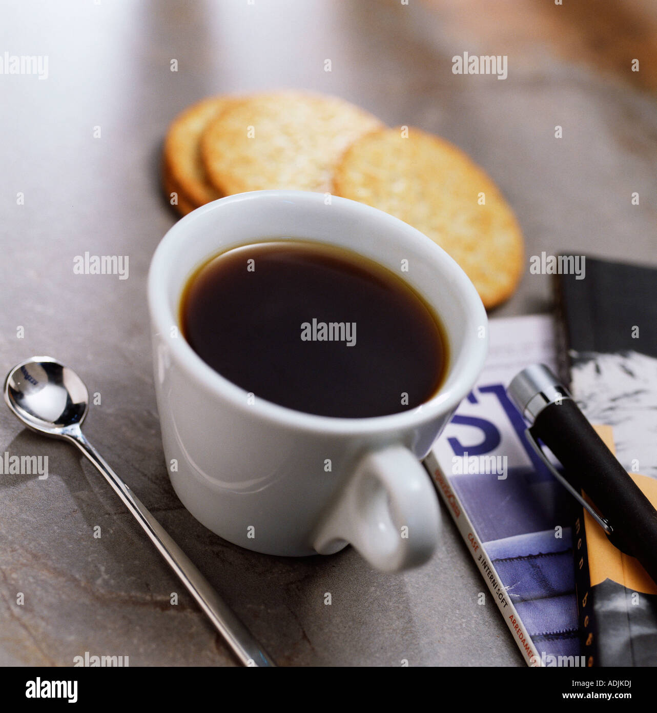Black coffee and crackers on the table Stock Photo - Alamy
