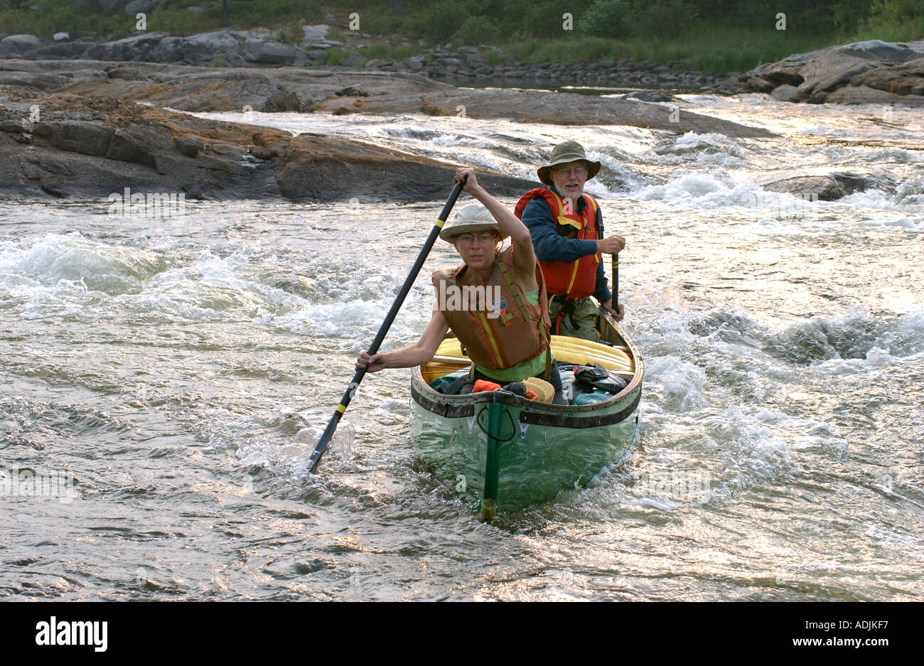 outdoor wilderness adventure adult canoeing Stock Photo - Alamy