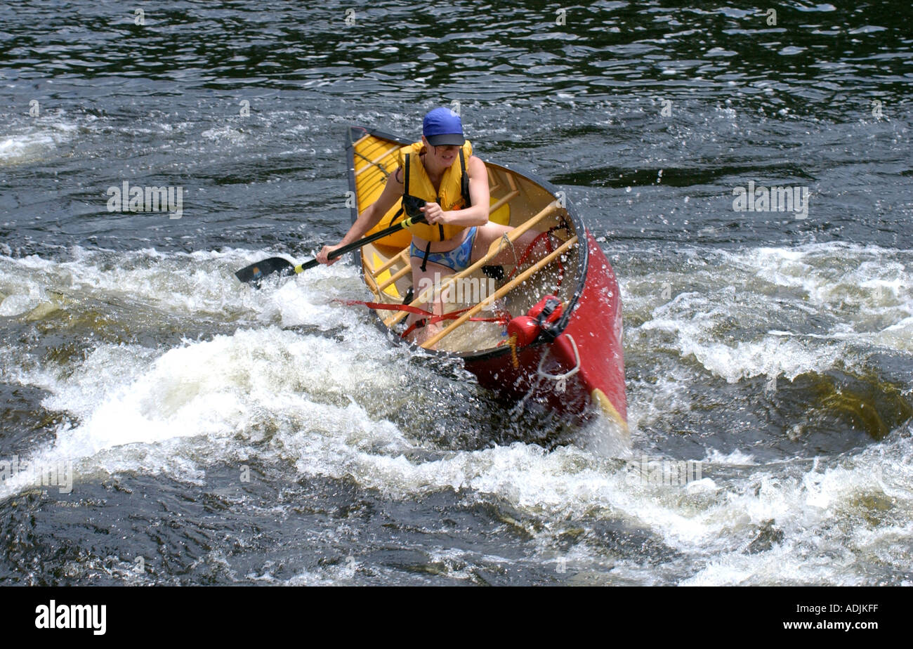 outdoor water action young adult canoeing Stock Photo - Alamy