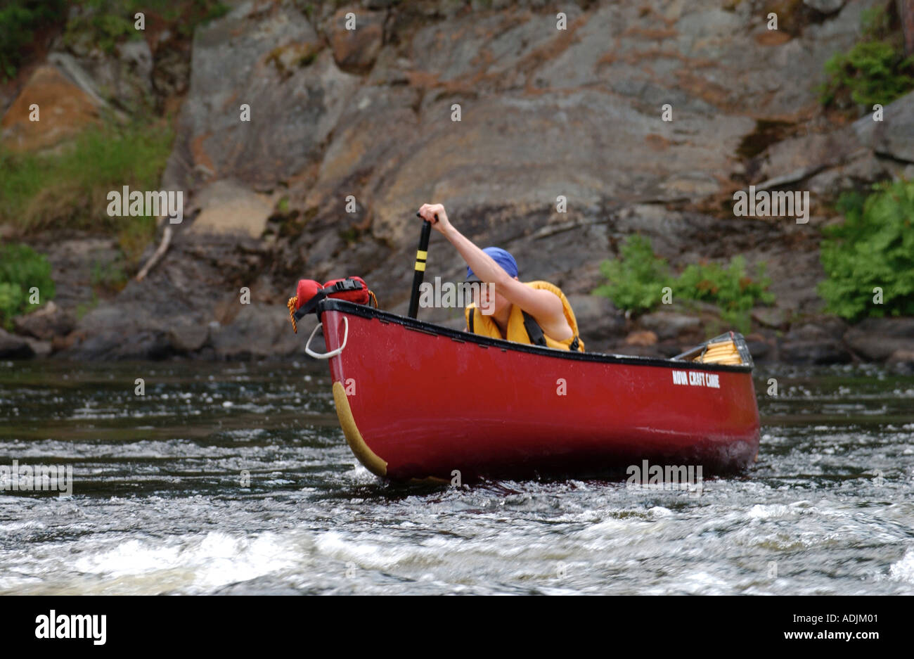 outdoor water action young adult canoeing Stock Photo - Alamy