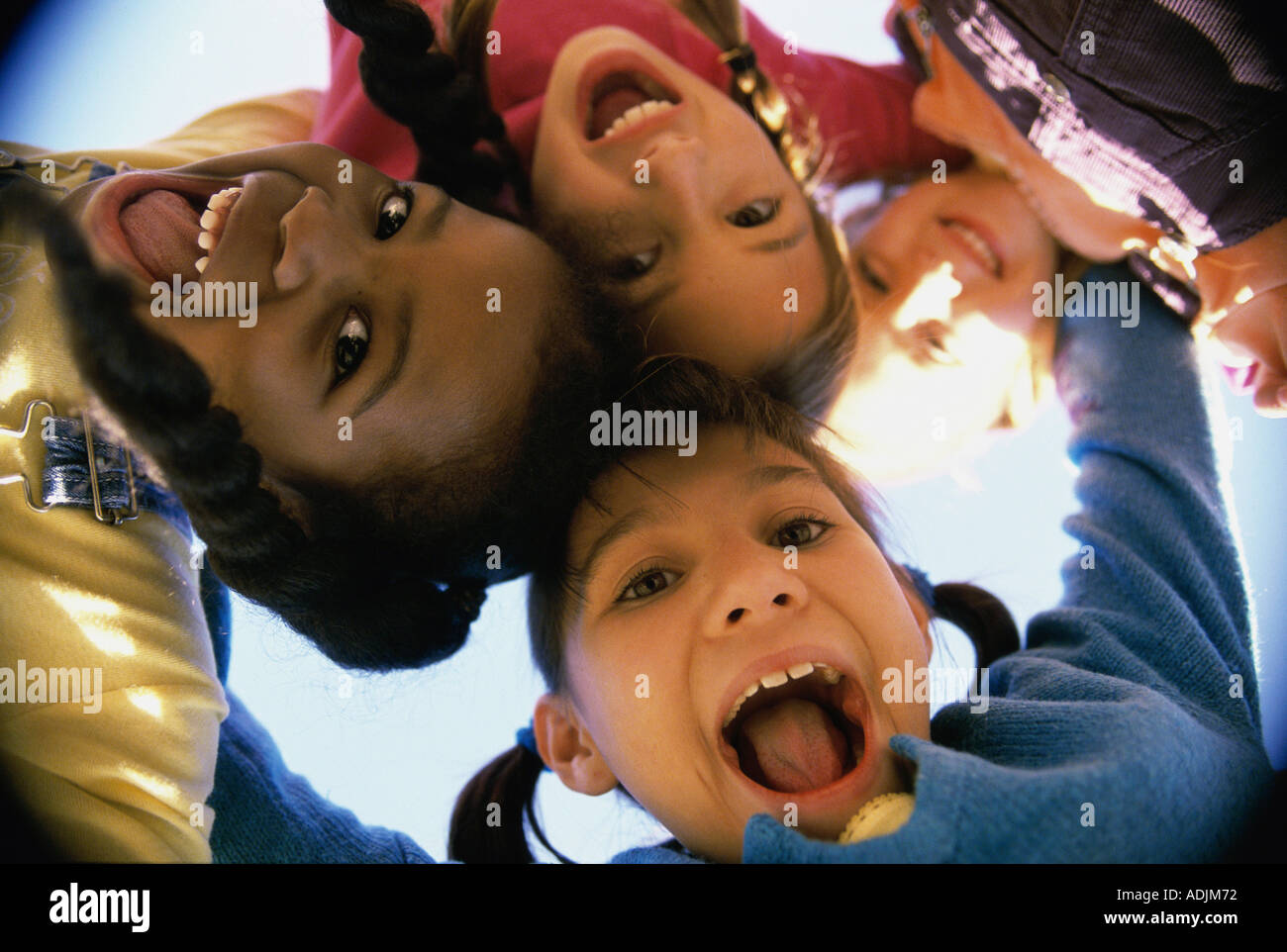 Children in circle looking down hi-res stock photography and images - Alamy