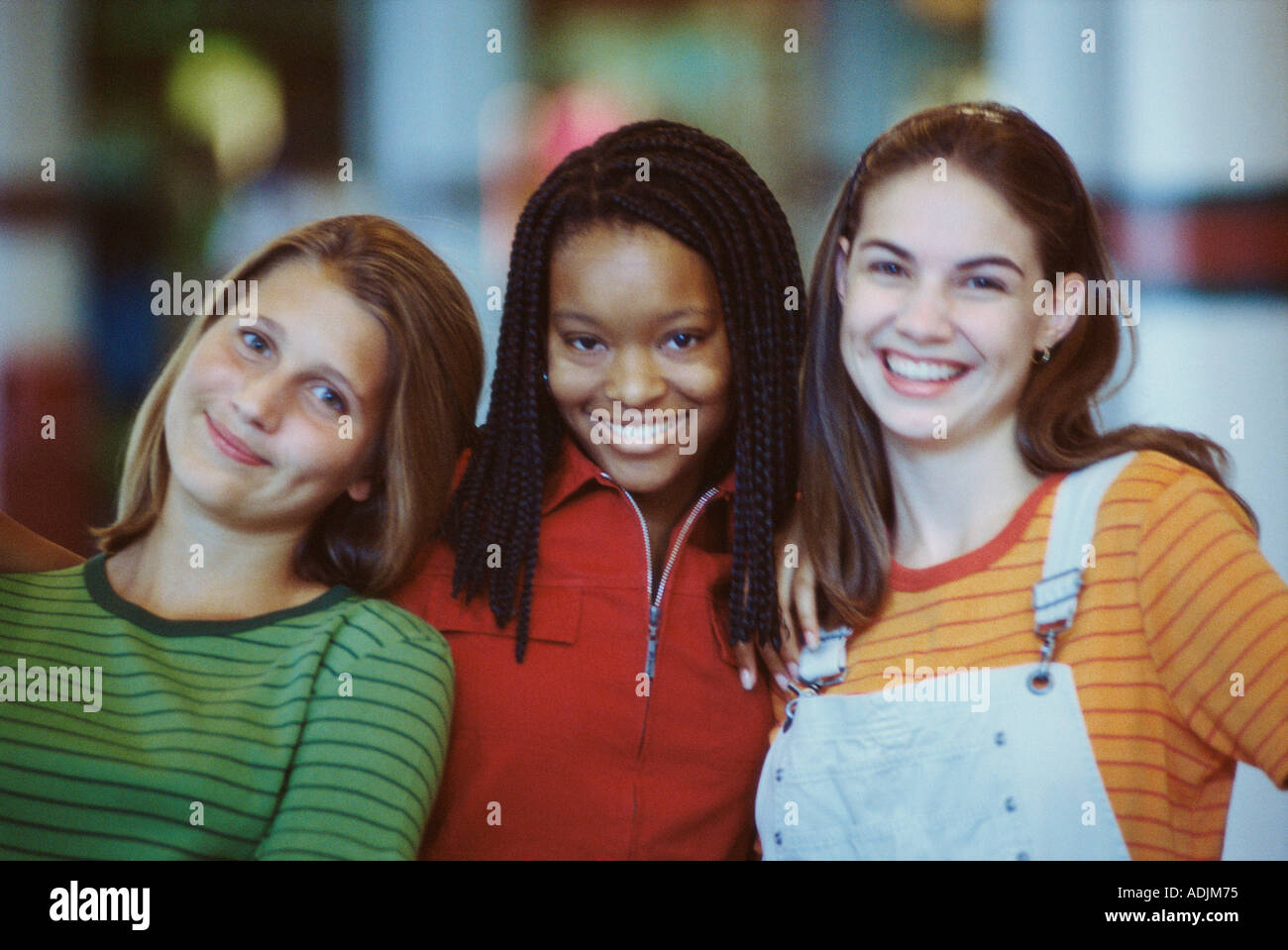 Portrait of three teenage girls smiling Stock Photo - Alamy