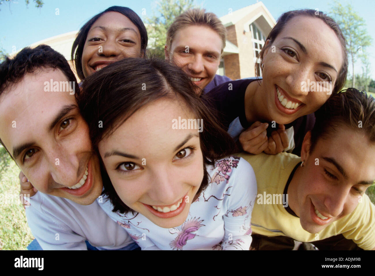 Portrait of a group of teenagers smiling Stock Photo - Alamy