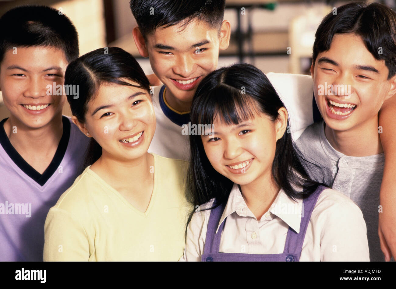 Portrait of a group of teenagers smiling Stock Photo - Alamy