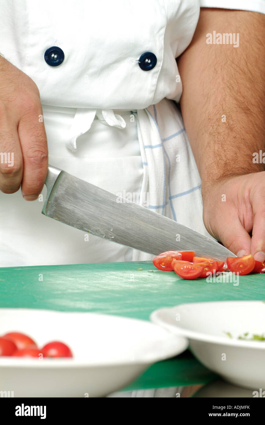 Close up chef slicing tomatoes hi-res stock photography and images - Alamy