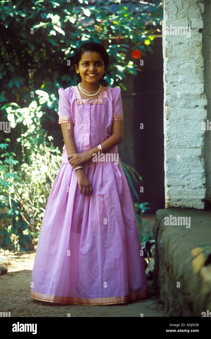 RHS70909 Rural Girl In traditional attire in front of her Home Pala ...
