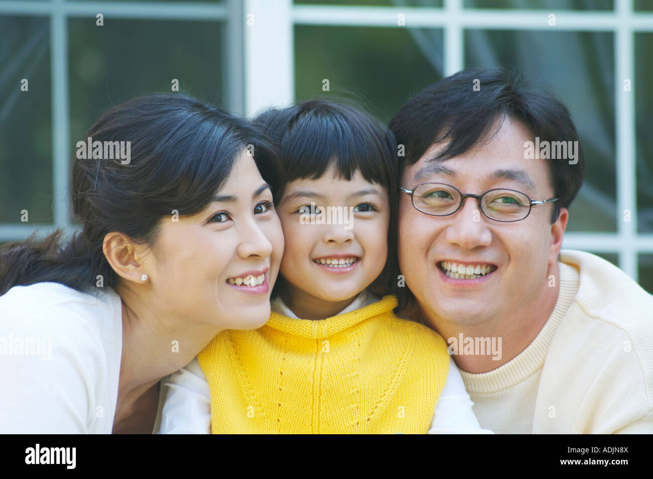 A Korean family making a smile Stock Photo - Alamy