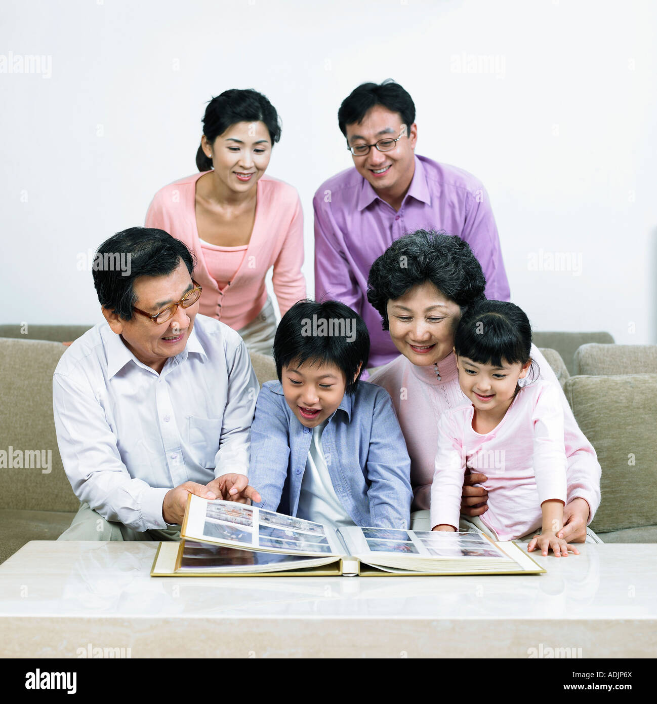 A Korean big family is having a good time in the their house Stock ...