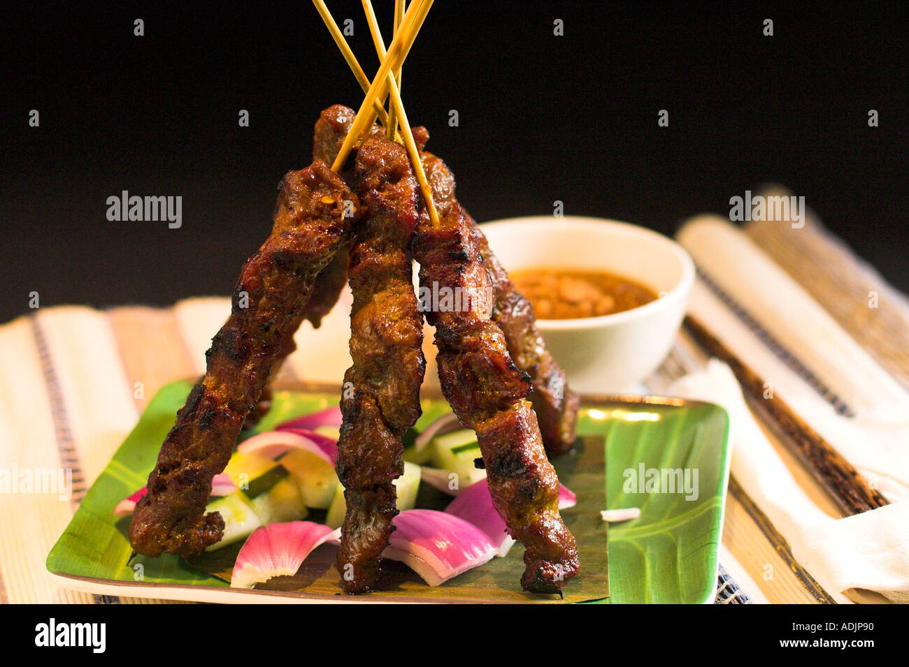 Beef or Chicken Satay with cucumber and onions Stock Photo - Alamy
