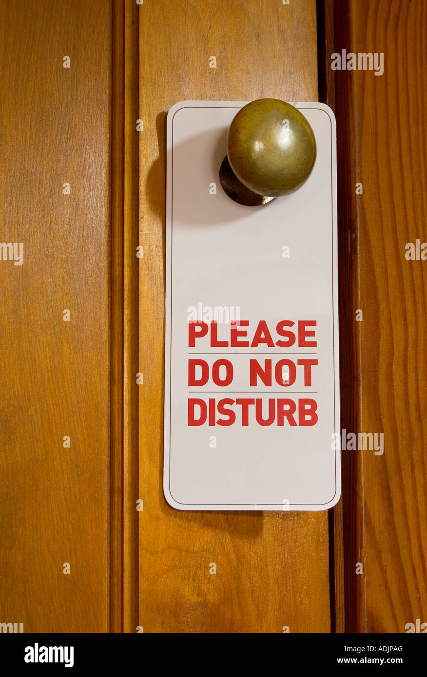 Do Not Disturb sign on a wood door Stock Photo - Alamy