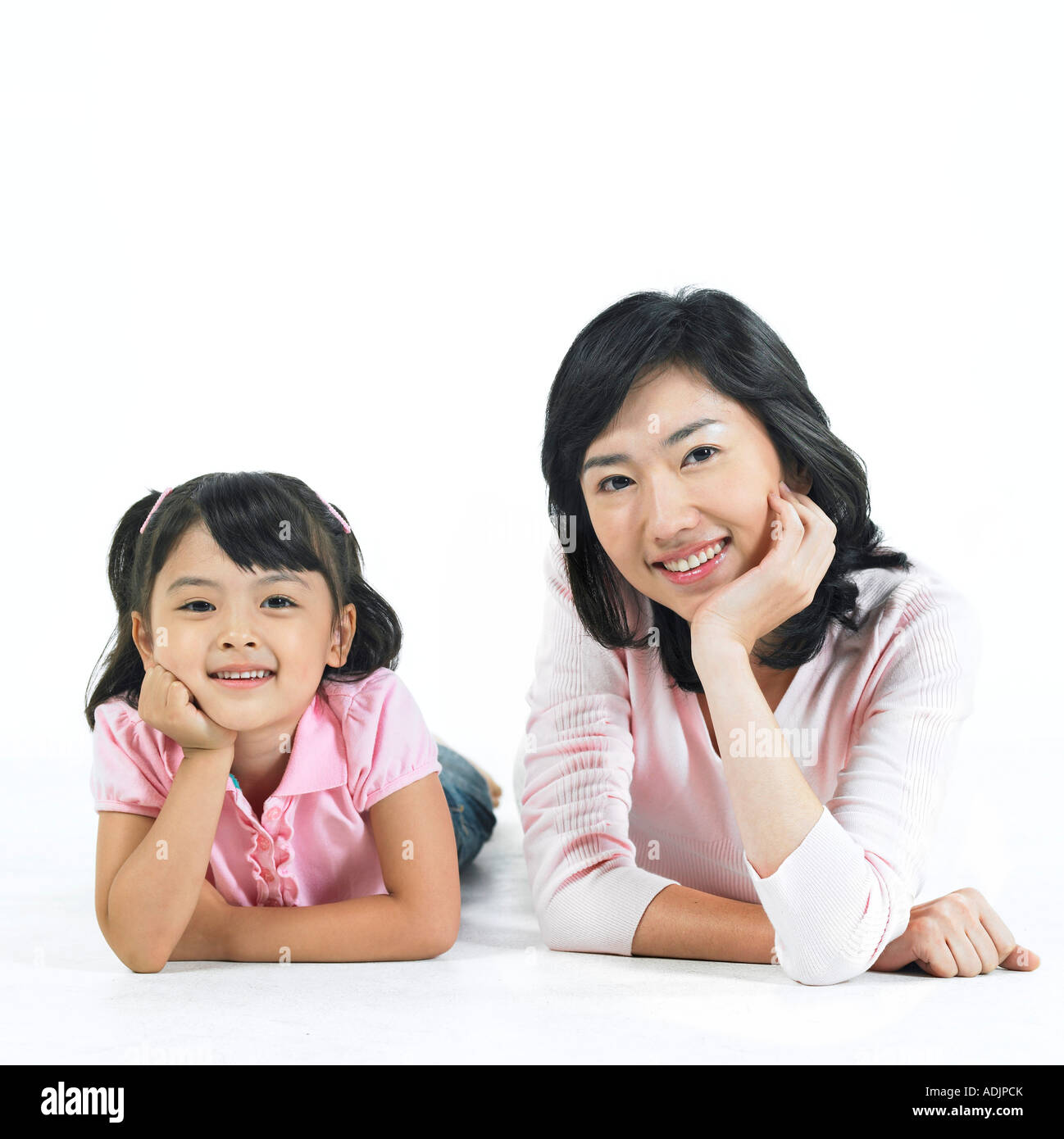 A Korean girl and her mother is making a smile Stock Photo - Alamy
