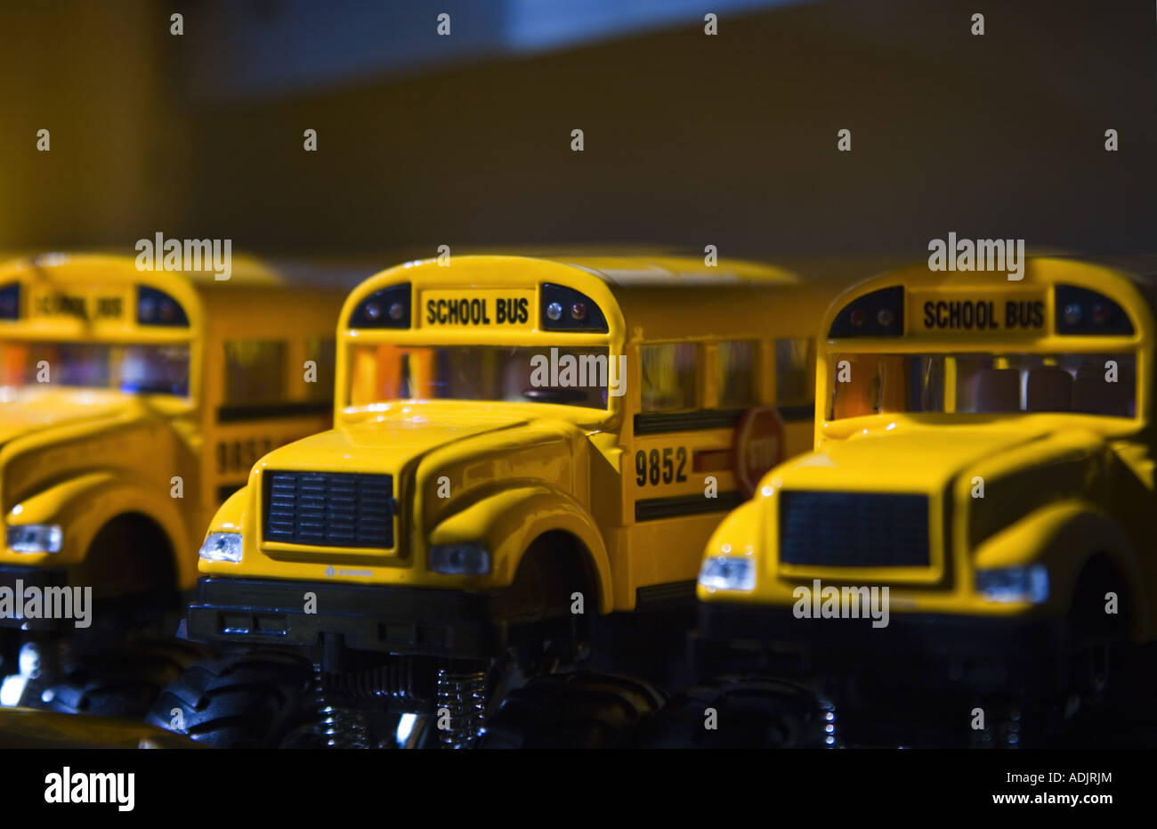 Toy School bus in shop window Stock Photo - Alamy