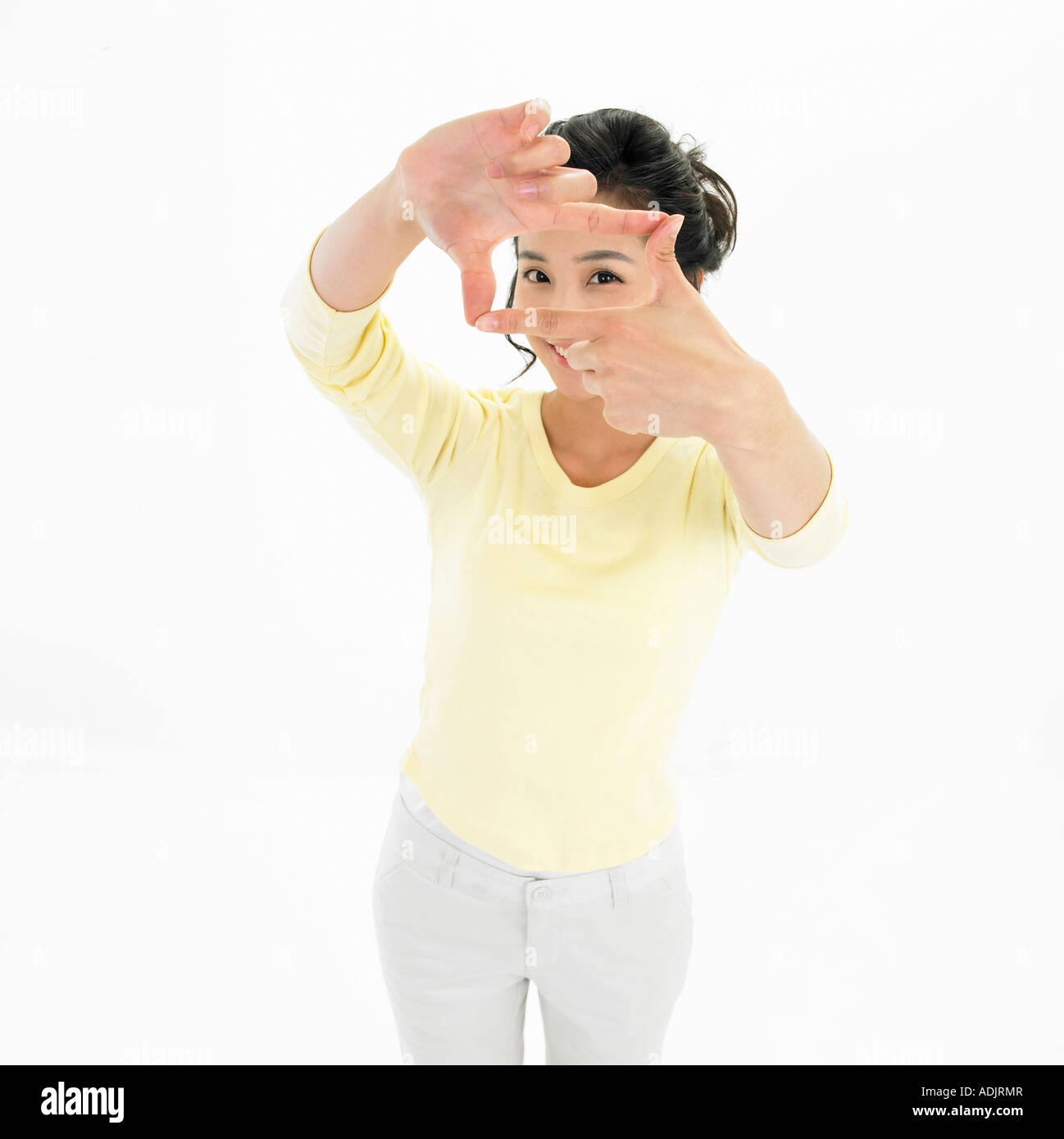 A woman is making a rectangle with her fingers Stock Photo - Alamy