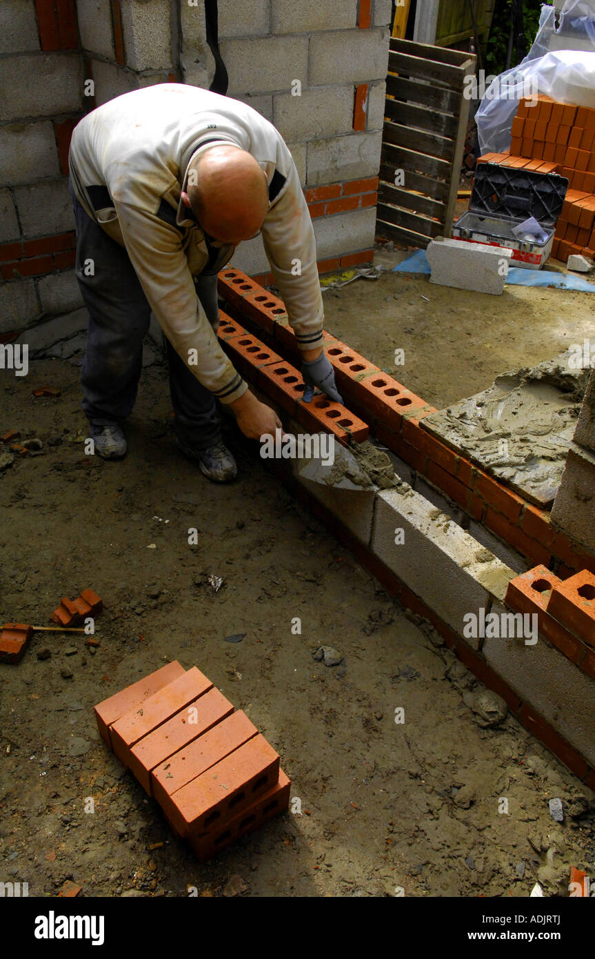 property developing building builder bricklayer bricks mortar house ...