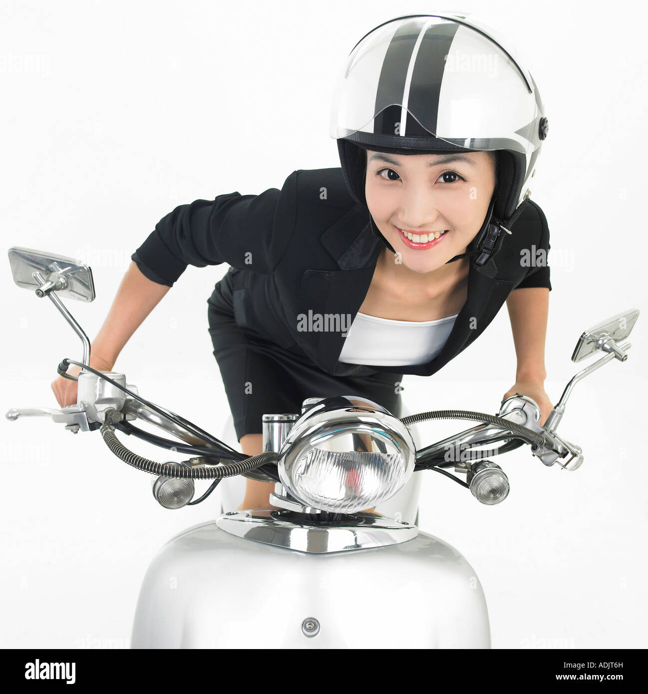 A woman drives a motorcycle Stock Photo - Alamy