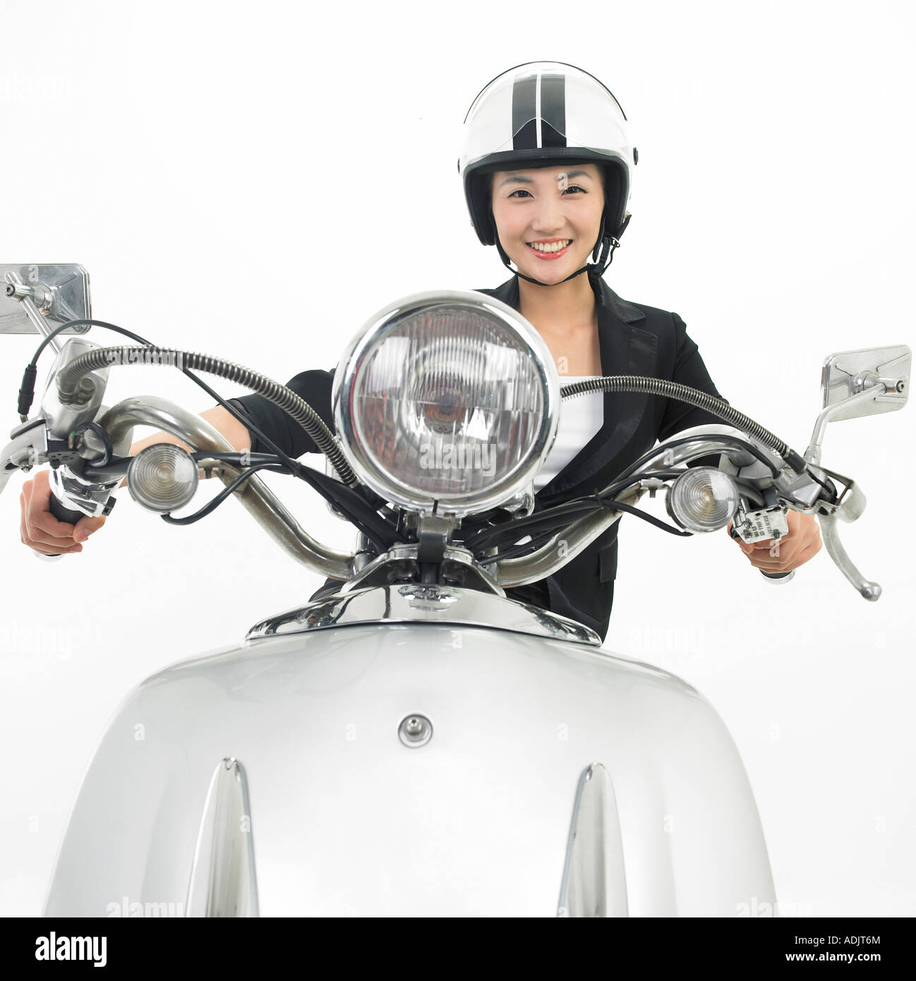 A woman drives a motorcycle Stock Photo - Alamy