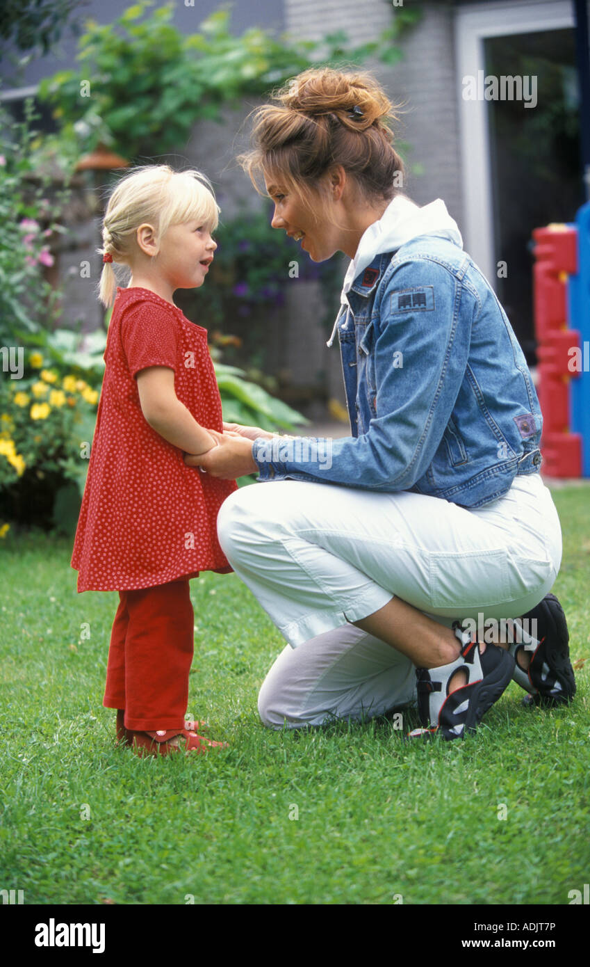 Mother talking to her daughter Stock Photo - Alamy