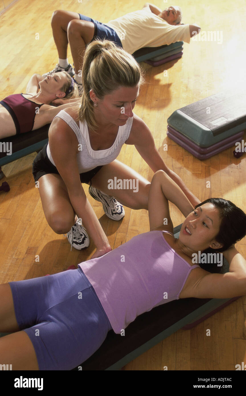 Mature woman exercising step class hi-res stock photography and images ...