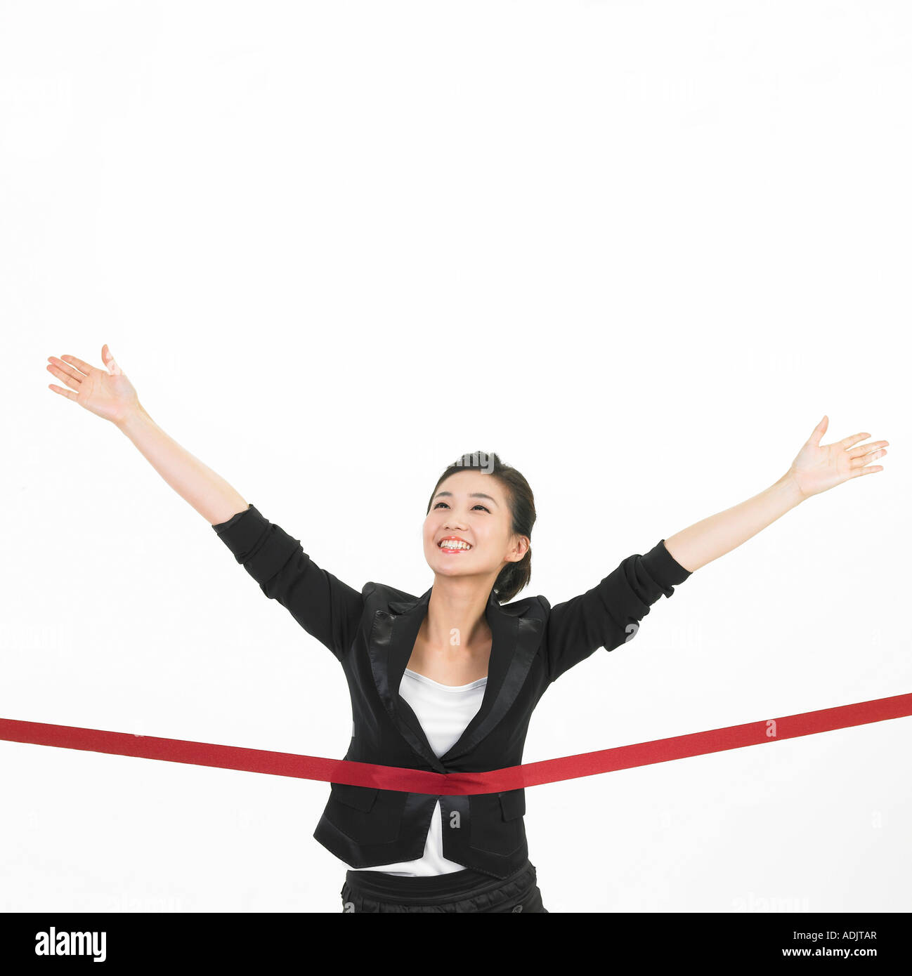 A woman reaching the finish line Stock Photo - Alamy