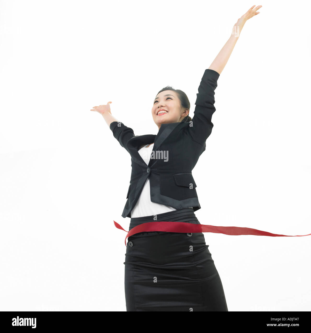 A woman reaching the finish line Stock Photo - Alamy