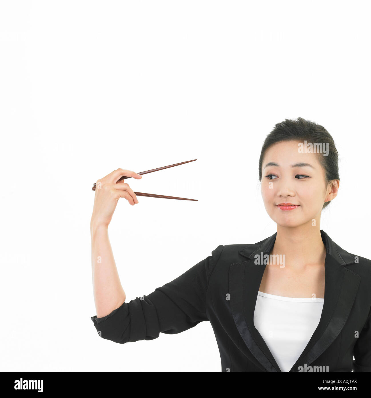 A woman holding the chopsticks Stock Photo - Alamy