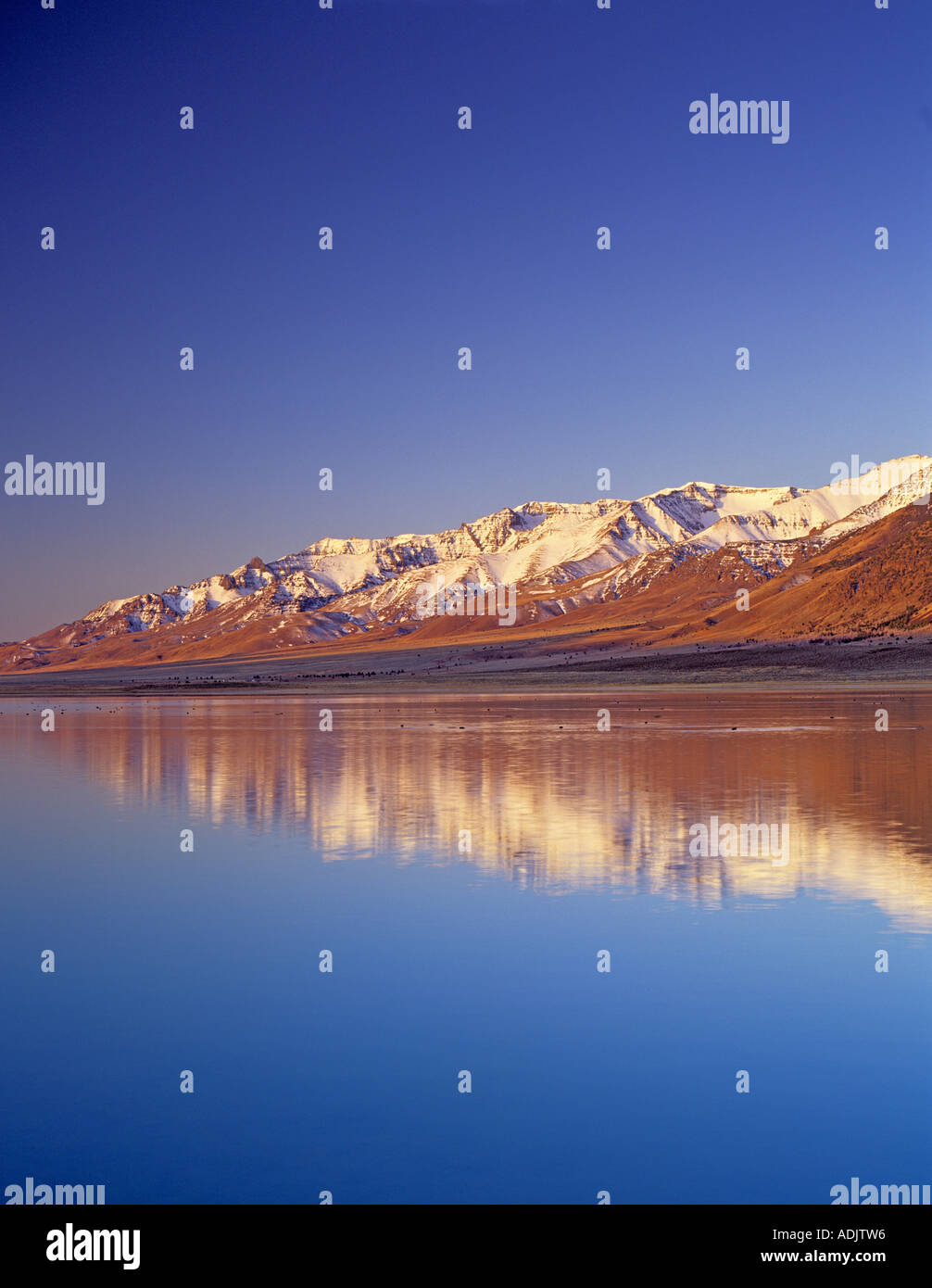 Sunrise on Steens Mountains with reflection in Mann Lake Oregon Stock ...