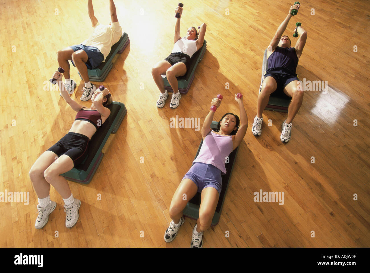 Mature woman exercising step class hi-res stock photography and images ...