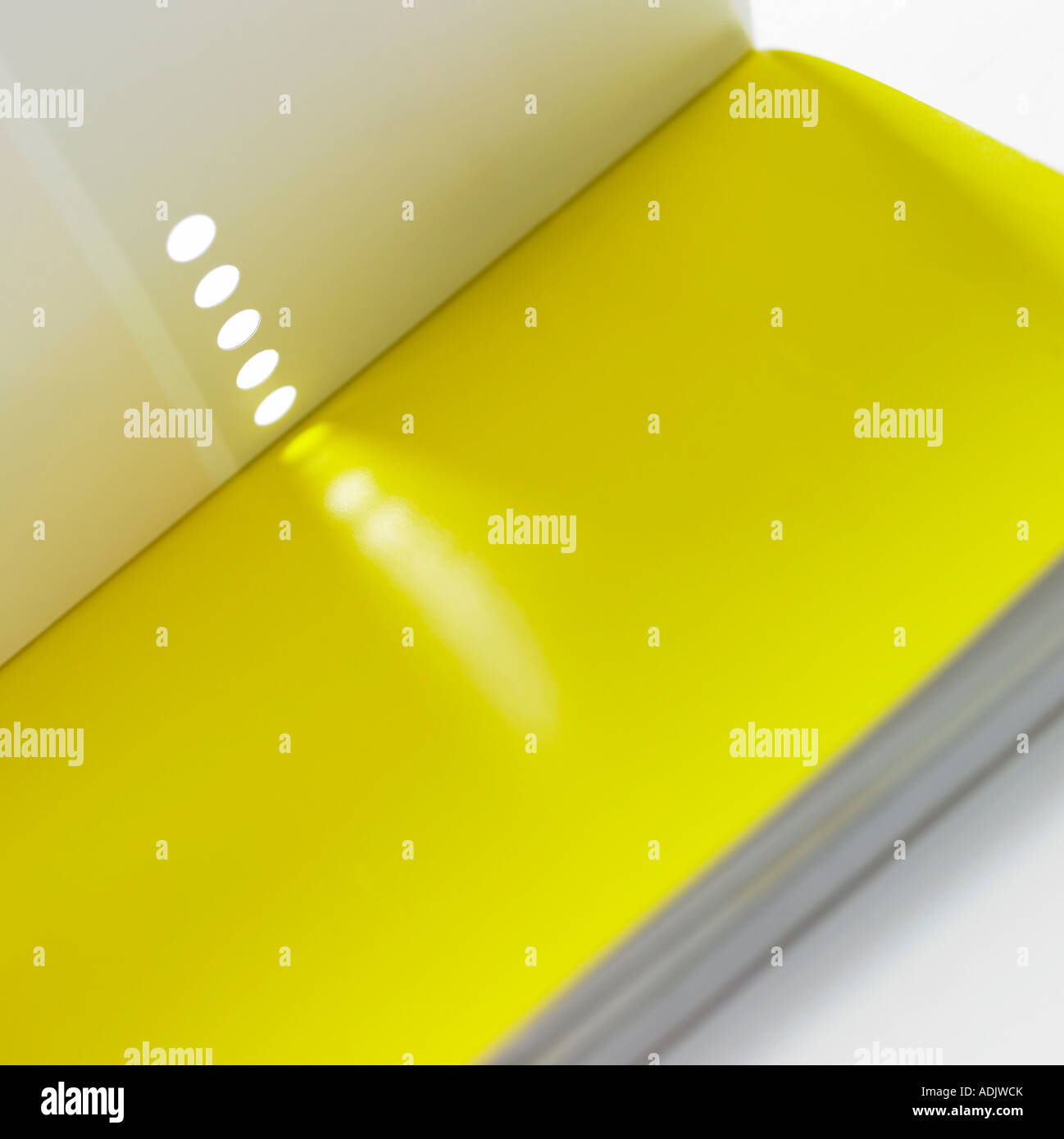 A notebook's hole highlighted Stock Photo - Alamy