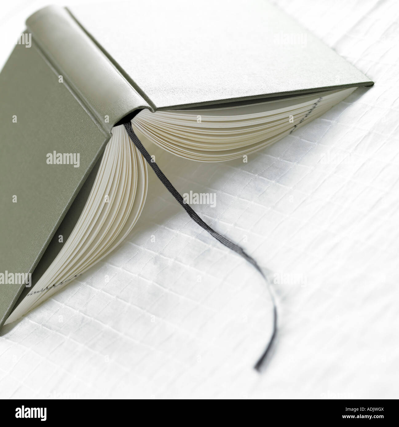 A book putting face down Stock Photo - Alamy