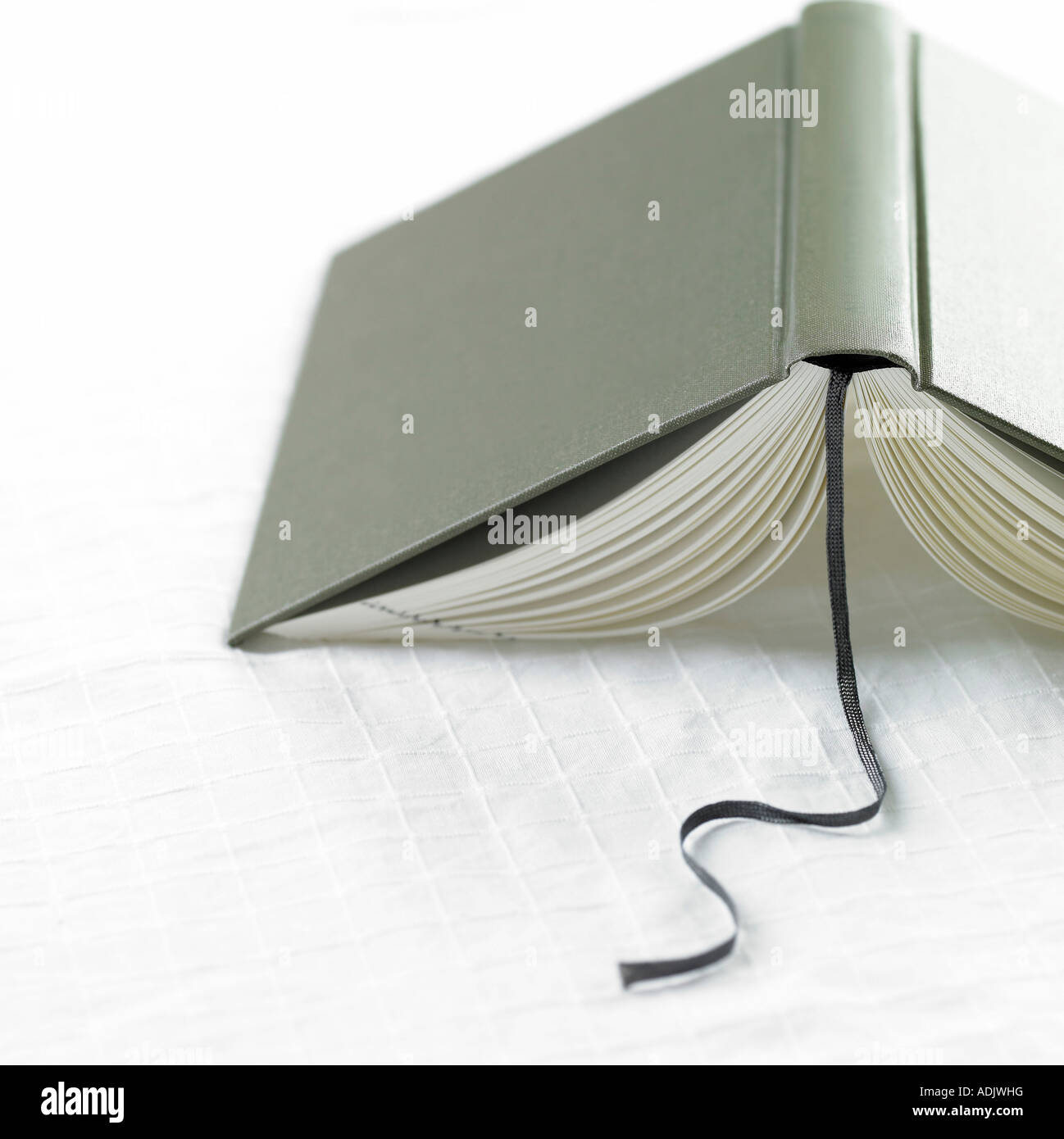A book putting face down Stock Photo - Alamy