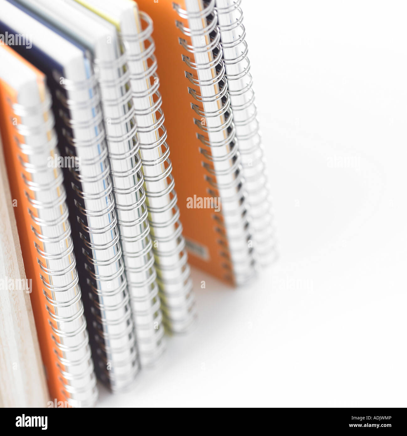 Notebooks with spring standing in a line Stock Photo - Alamy