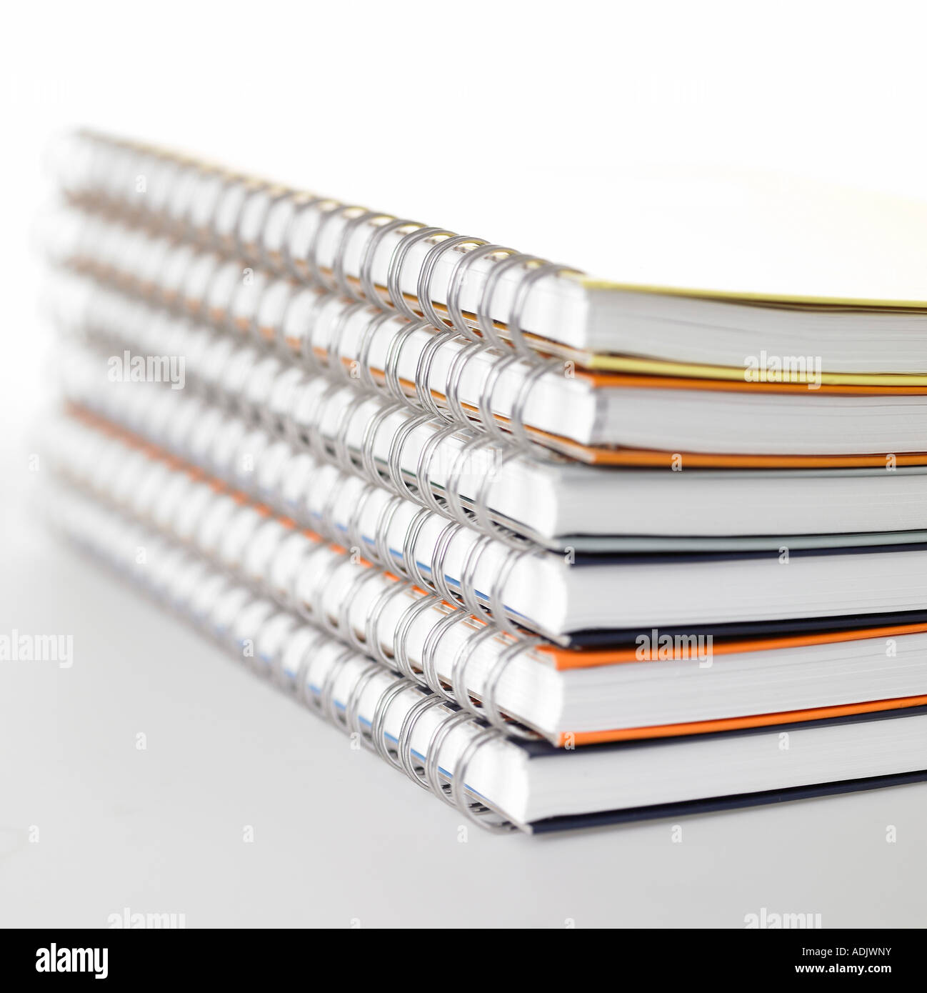 Notebooks with spring piled Stock Photo - Alamy